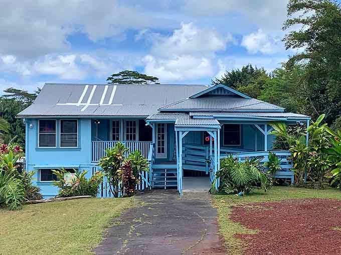 This charming plantation-style home, painted the color of Hawaiian skies, represents affordable island living at its finest.