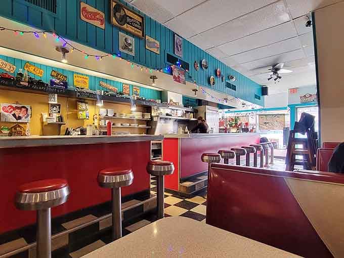 Red vinyl booths, checkered floors, and chrome stools create the perfect setting for your time-traveling breakfast adventure today.
