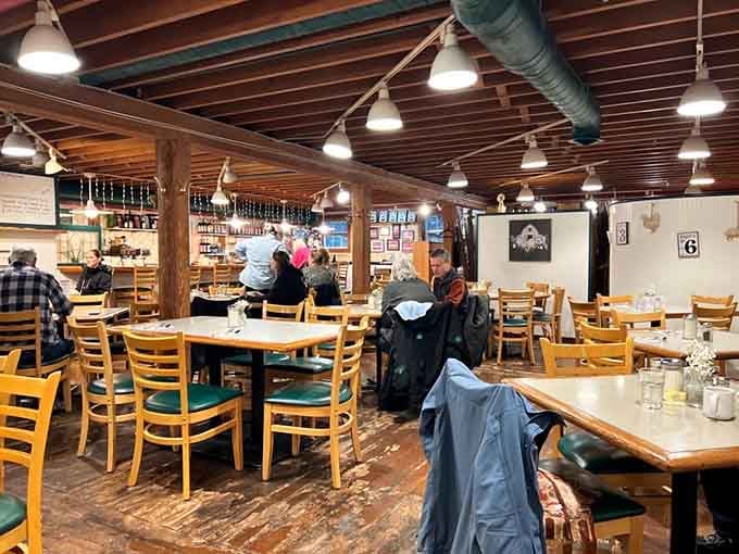 Step inside this converted schoolhouse where wooden beams and cozy tables create the perfect breakfast classroom atmosphere.