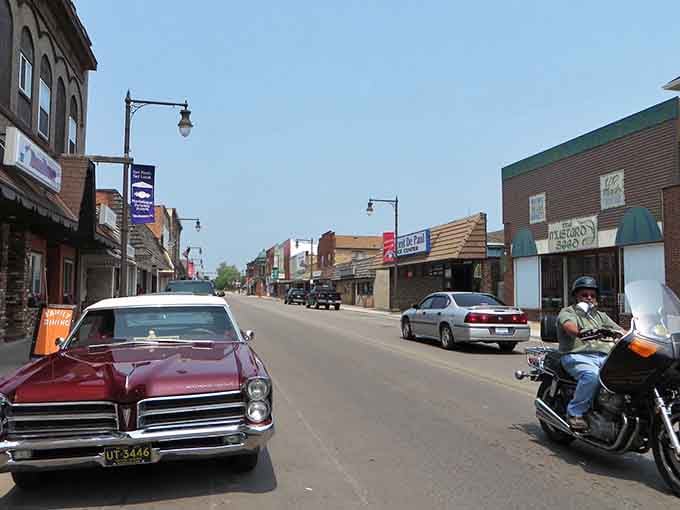 Classic cars and motorcycles cruise streets where time moves slower and conversations last longer than expected.