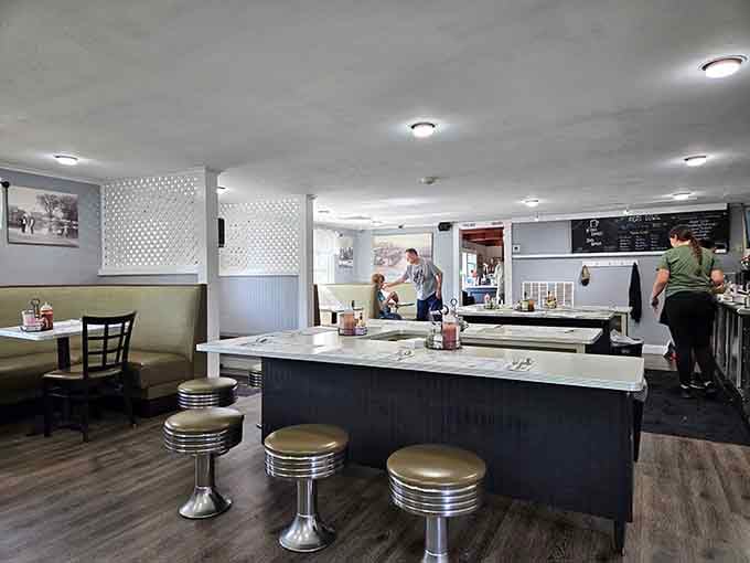 Chrome stools and booth seating prove that sometimes the best design choice is not overthinking it and just feeding people well.