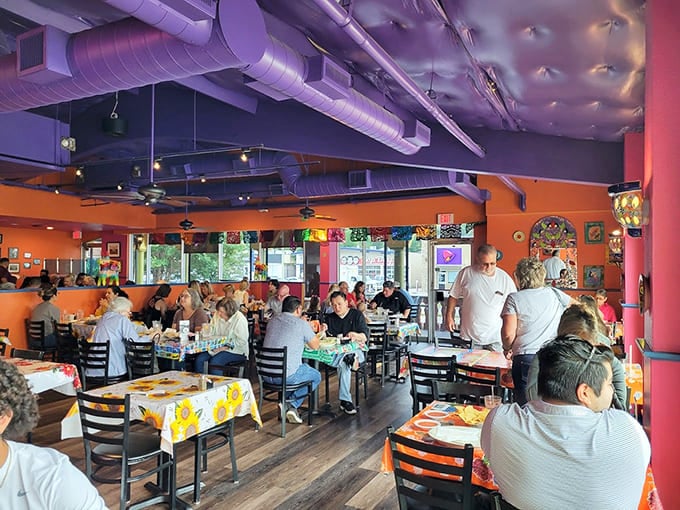 Step inside where purple meets orange in a color explosion that somehow feels exactly right for serious Tex-Mex eating.