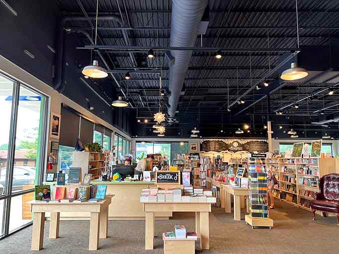 Industrial chic meets cozy reading room in this beautifully designed space that understands modern comfort.