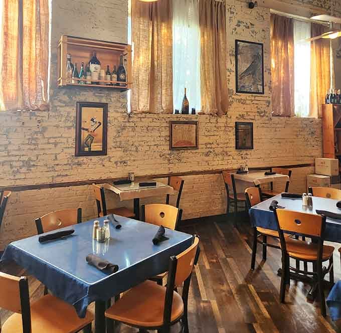 Exposed brick walls and warm lighting create the kind of cozy atmosphere where calories don't count and worries disappear.