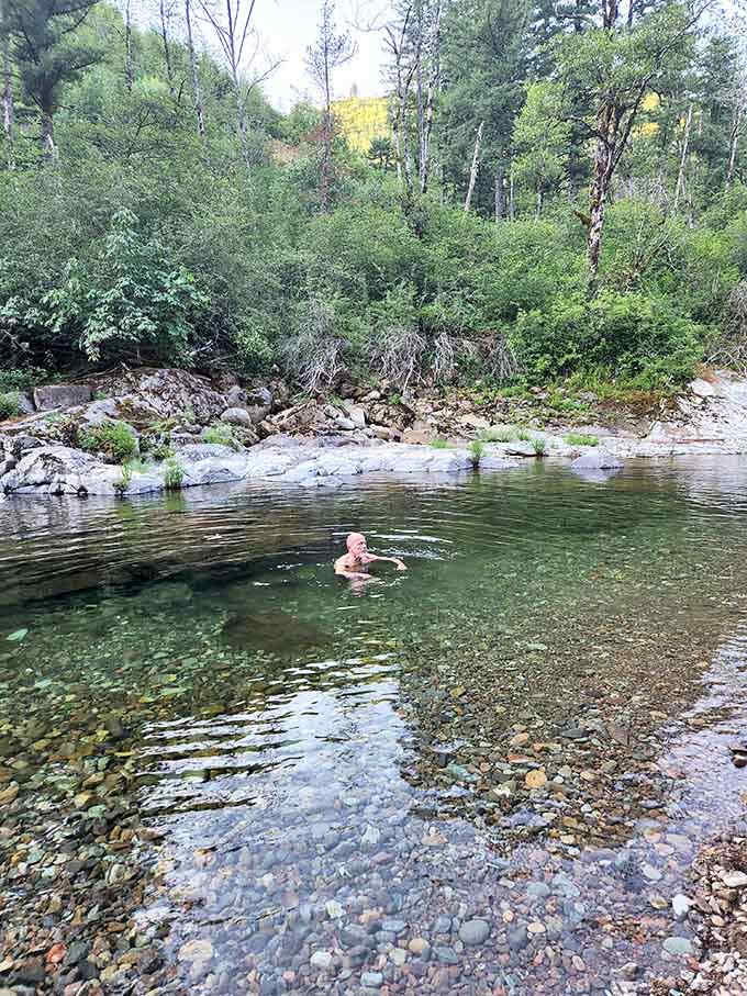 That brave soul floating proves the water's cold enough to wake you up faster than your morning coffee ever could.