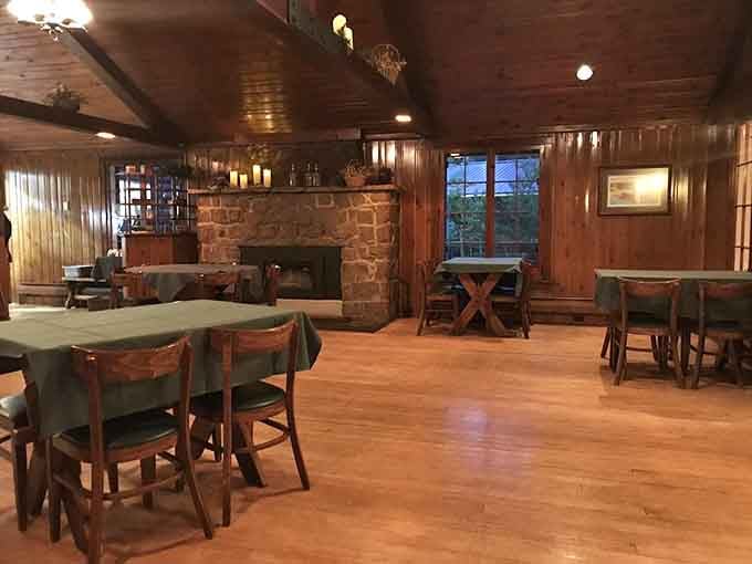 Wood paneling and that magnificent stone fireplace create the kind of cozy atmosphere that makes you never want to leave.