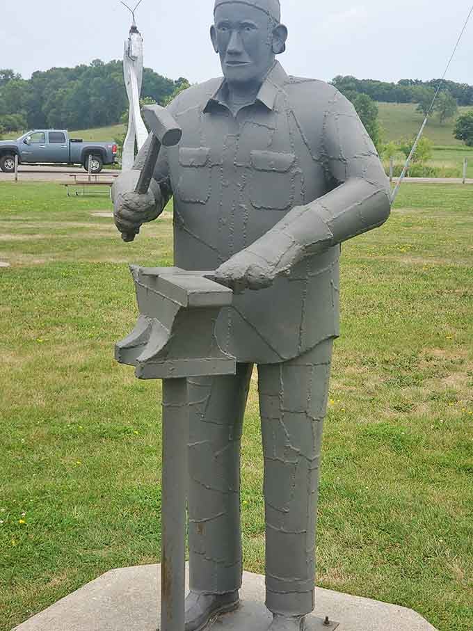 This welded fisherman stands ready for the big catch, proving folk art can be both whimsical and wonderfully detailed.