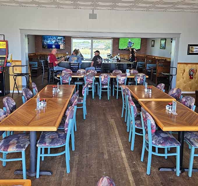 Turquoise chairs and water views create the perfect setting for serious seafood consumption and even more serious relaxation.