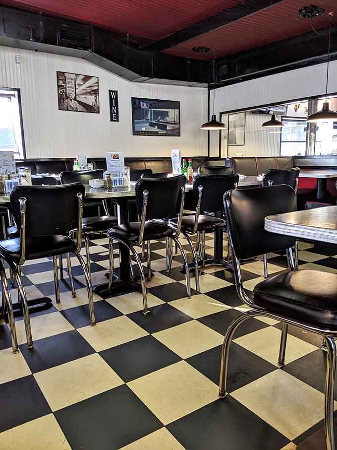Checkerboard floors and chrome chairs create a time machine effect that requires zero flux capacitor to operate successfully.