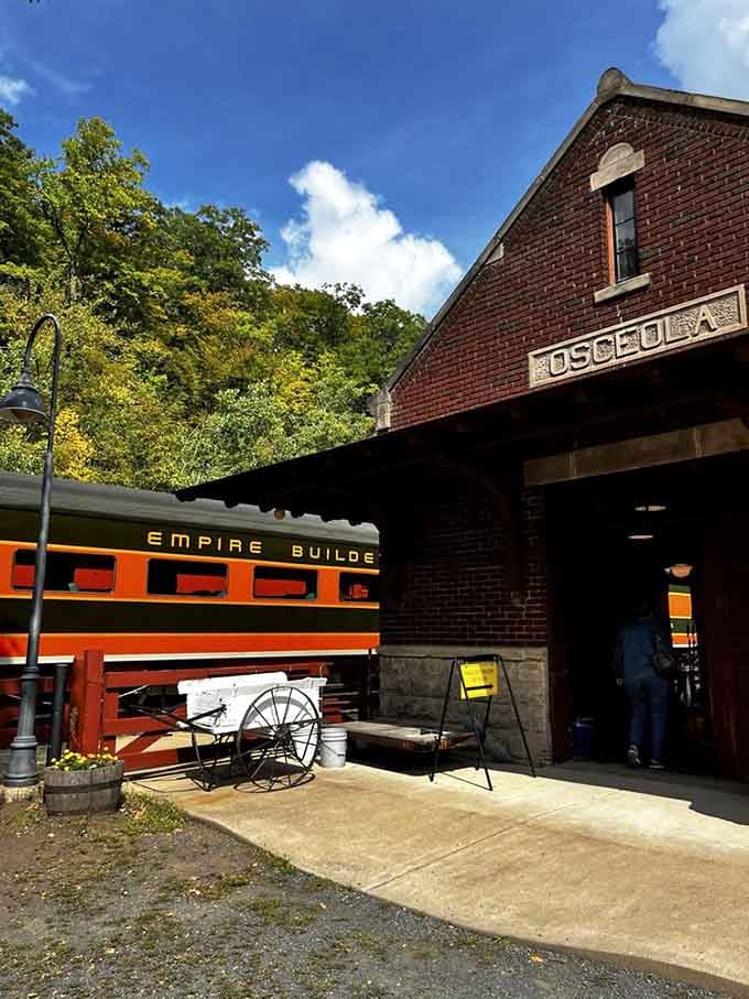 The historic Osceola depot stands proud in brick, where antique farm equipment and colorful train cars create an Instagram opportunity your grandkids will actually appreciate.