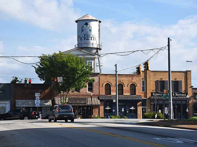 Classic storefronts and that iconic water tower remind you why small towns are worth celebrating every single day.