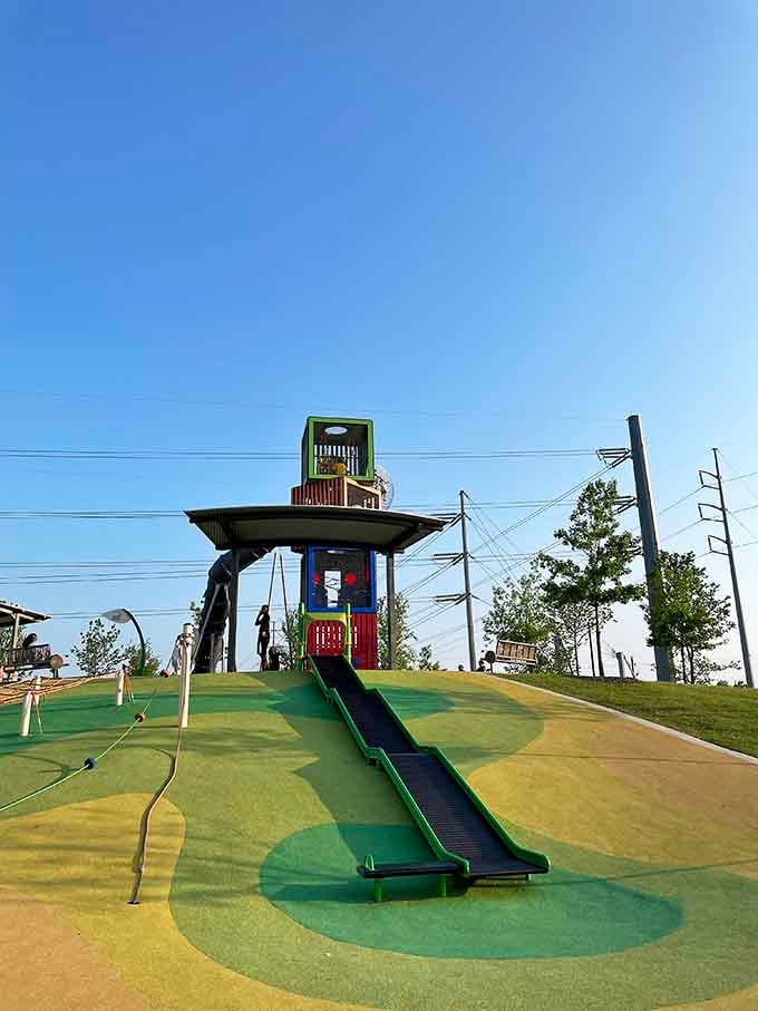 That towering slide structure isn't messing around&mdash;it's the kind that makes adults suddenly remember urgent phone calls to make.