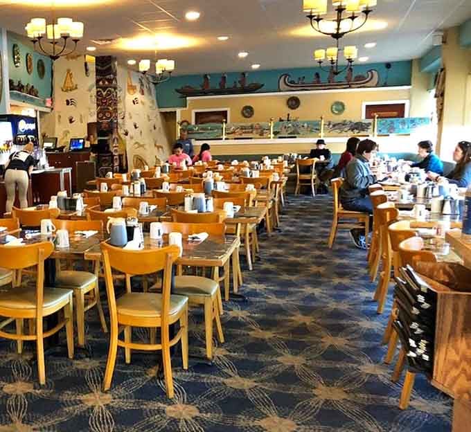 Light wood tables, turquoise accents, and enough seating to handle the breakfast rush that never seems to end here.