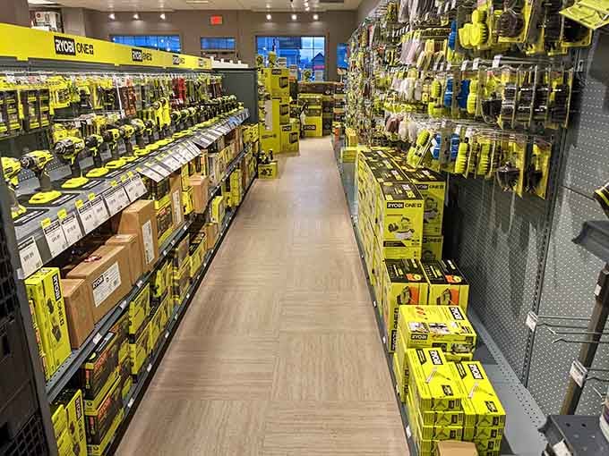 Power tools organized like a hardware symphony, where every yellow-handled gadget promises to fix something you didn't know was broken.