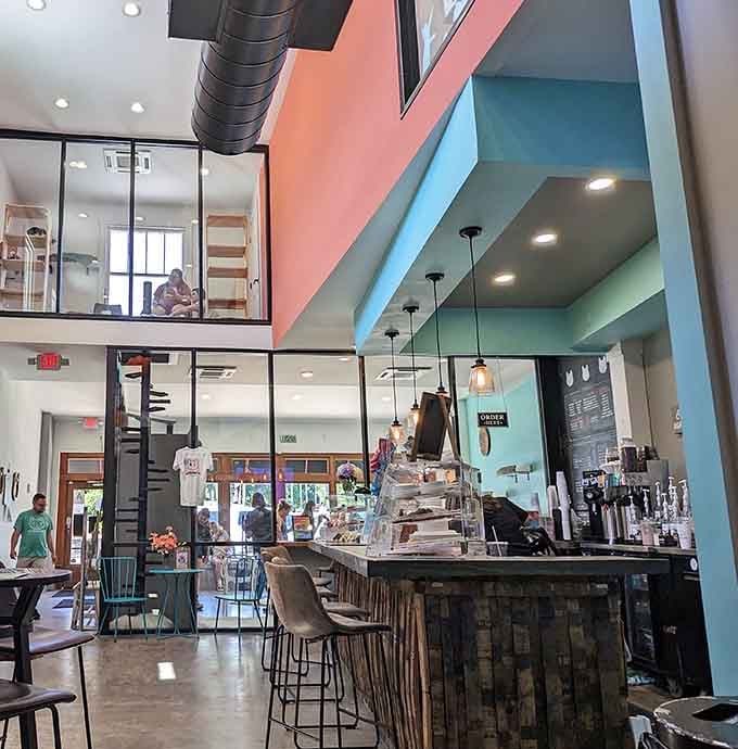 Industrial chic meets feline paradise, complete with a mezzanine for cats to properly judge you from above.