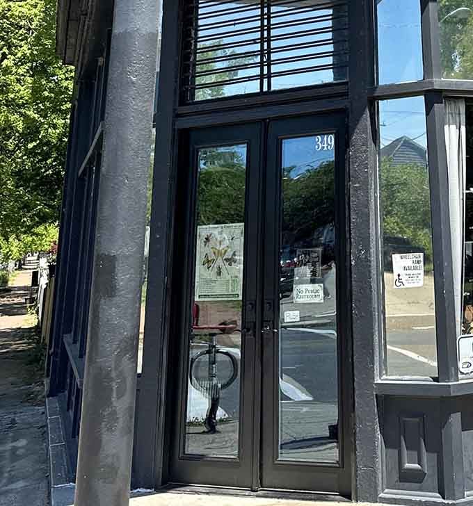 Even the door handle knows commitment to theme matters, welcoming you with a skeletal handshake to remember.