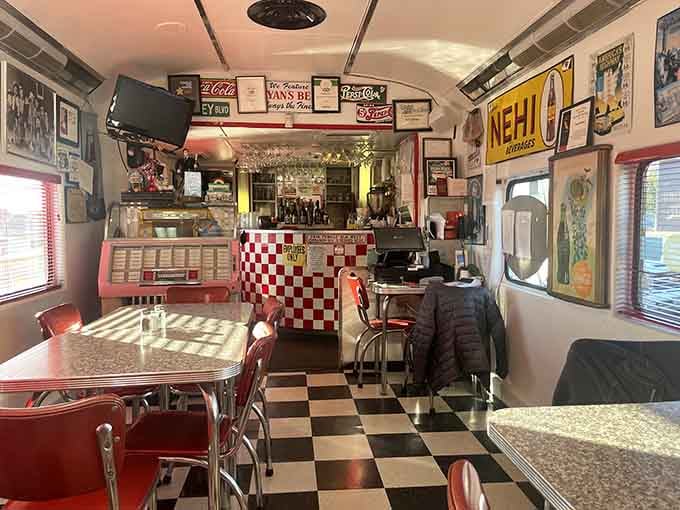 Step inside where every square inch tells a story, from vintage signs to that irresistible checkered floor below.