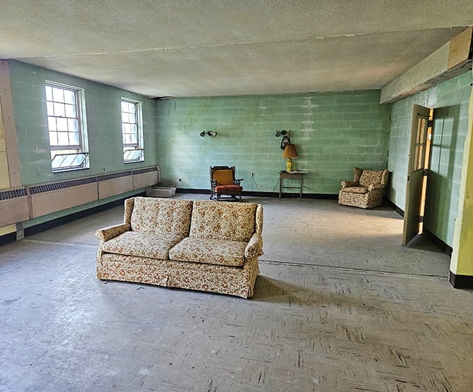 Those vintage floral couches have witnessed more than their share of history within these mint-green institutional walls.