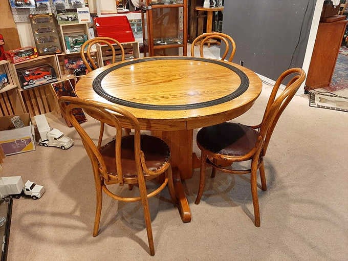 This isn't just furniture&mdash;it's a time capsule with chairs. Imagine the family dinners and card games this oak beauty has witnessed.