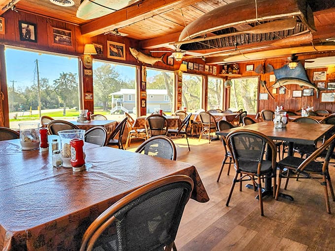 Wood-paneled walls and fishing memorabilia create the perfect backdrop for cracking crabs and making memories.
