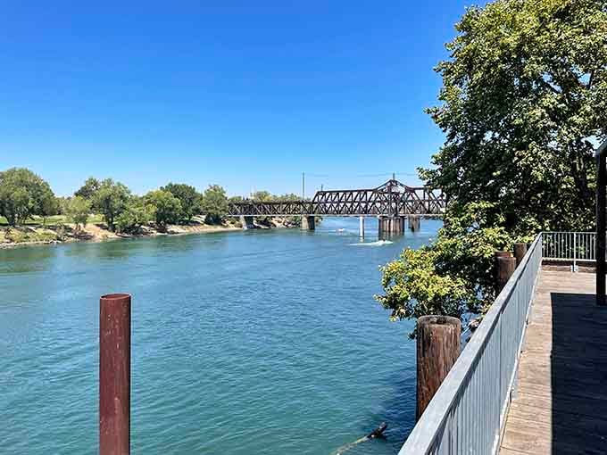 The Sacramento River flows with the kind of blue-green beauty that makes you forget you're in California's capital city.