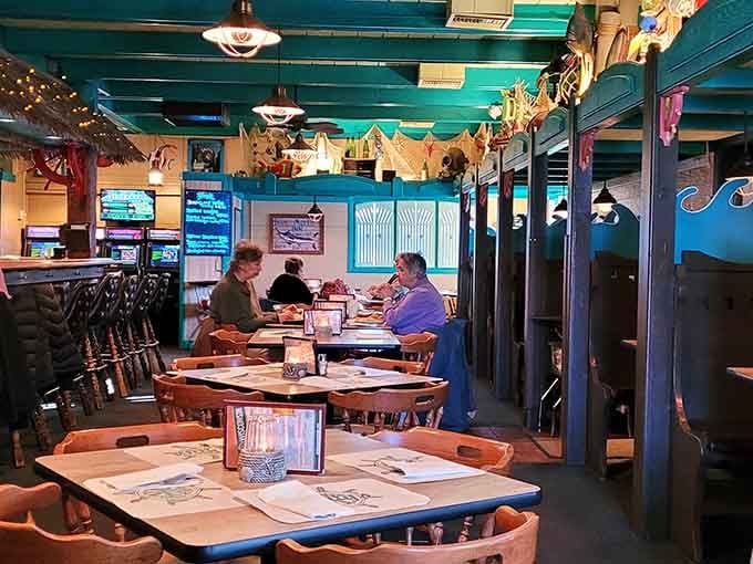 Turquoise ceiling beams and nautical touches transform this Wisconsin dining room into a coastal getaway. No passport required, just an appetite.
