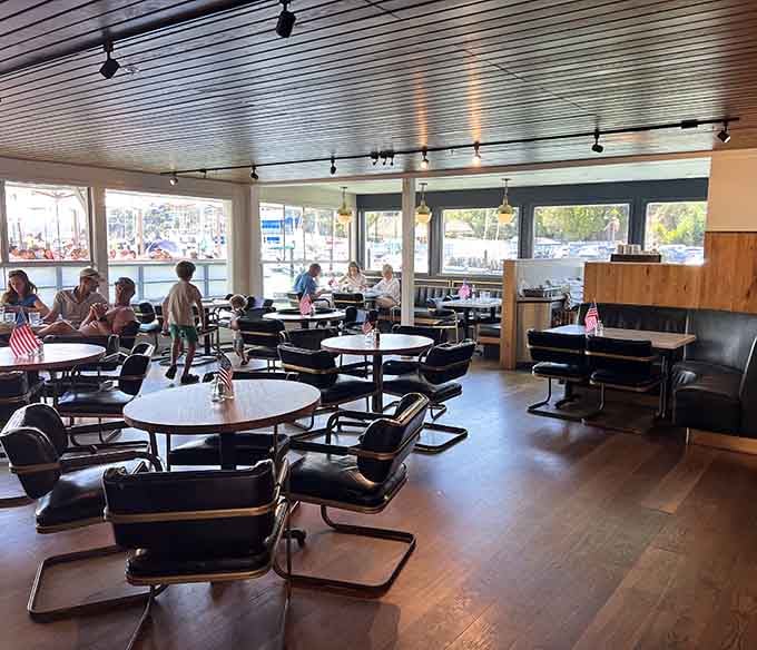 Inside, those panoramic bay windows frame million-dollar views while you enjoy your meal in comfortable, nautical-inspired surroundings.