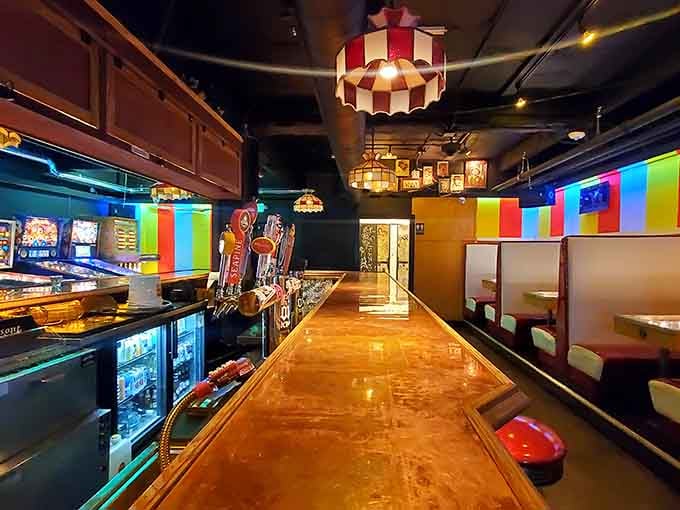 Behold the skeeball lane where friendships are tested and bragging rights are earned over perfectly grilled hot dogs.