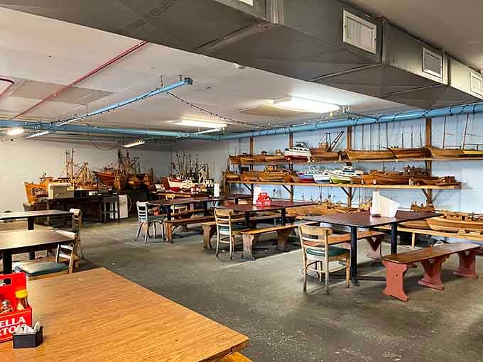 Model ships overhead remind you where your meal came from while you enjoy maritime-themed comfort.