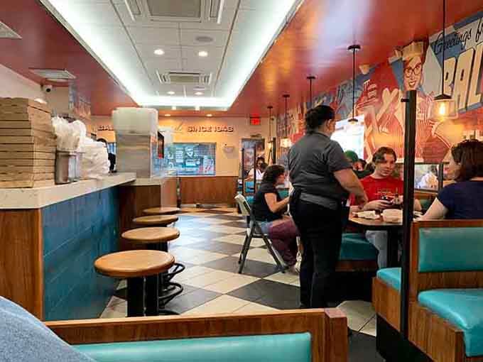 Classic diner booths where countless conversations have happened over coffee refills, from first dates to last goodbyes.