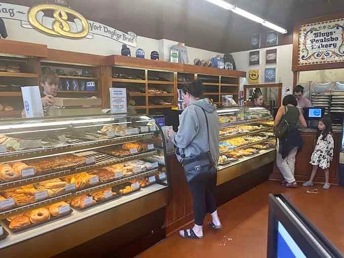 Those gleaming display cases hold more temptation than you can reasonably resist on a single visit, trust me.