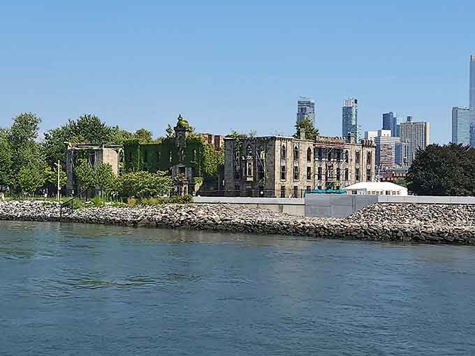 From the water, the ruins look like a forgotten castle guarding secrets the city would rather not remember.