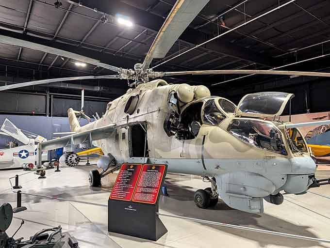 This Mi-24 Hind looks like it flew straight out of an action movie and decided retirement wasn't so bad.