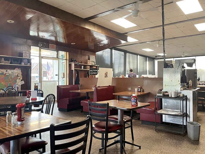 Wood paneling and red vinyl booths create the kind of timeless diner atmosphere that never goes out of style.
