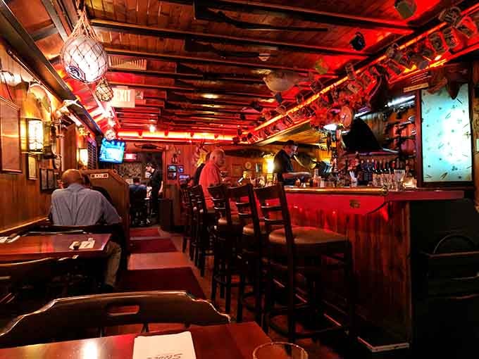 Wood paneling and warm lighting create the kind of atmosphere where Frank Sinatra would've felt right at home ordering another round.