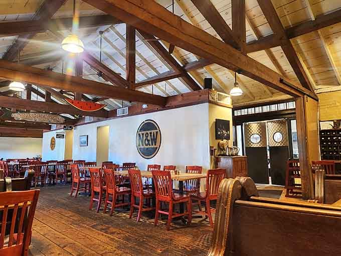 Those exposed beams aren't just for show; they're holding up dreams of perfectly cooked steaks and passing locomotives.