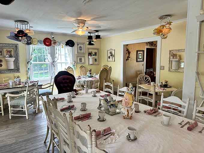 Mismatched chairs, dangling teacups, and hats galore create the most delightfully organized chaos you've ever seen.