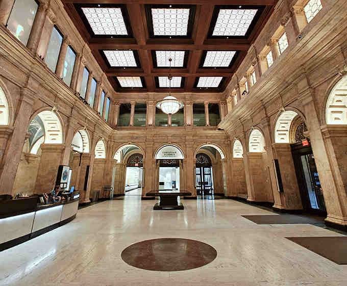 The grand hall welcomes you with classical architecture that whispers elegance before you discover the glowing globe within.