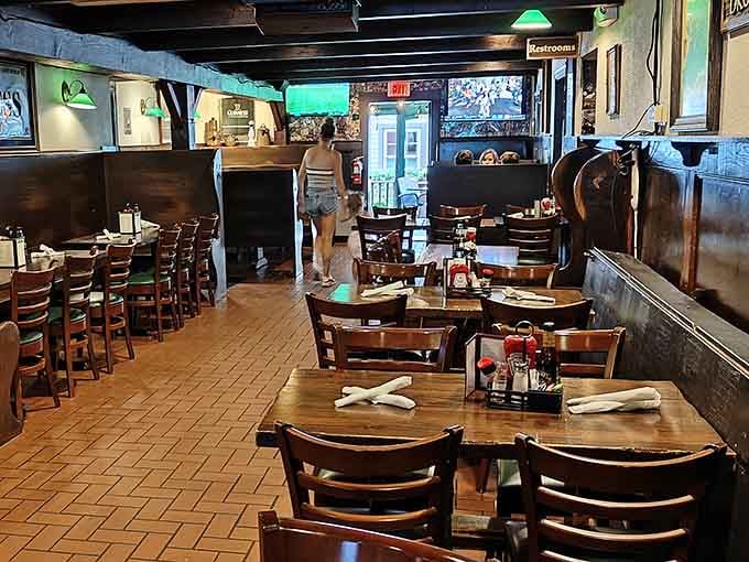 Dark wood beams and cozy booths create the kind of atmosphere where time slows down and conversations actually happen.