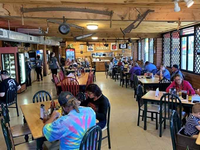 Inside, Route 66 nostalgia meets comedy club, where ordering dinner requires a sense of humor and an empty stomach.