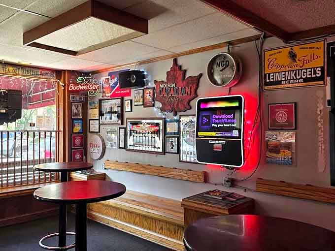 Beer signs and nostalgia cover every inch, creating the perfect backdrop for your burger adventure.