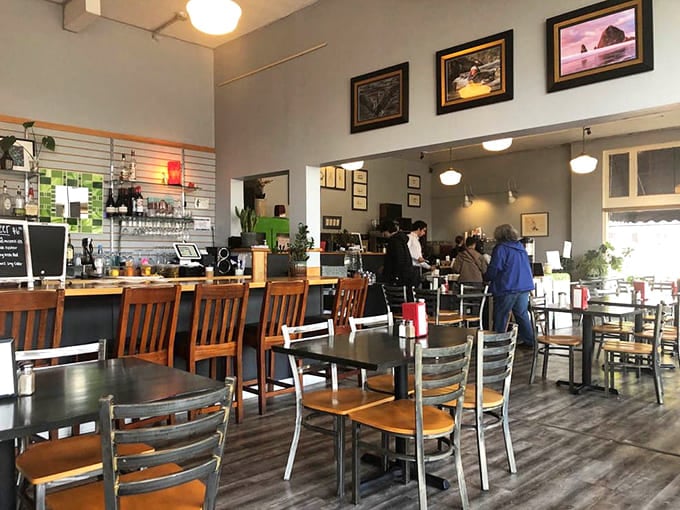 The connected cafe offers cozy indoor seating where you can enjoy your waffle haul without weather worries.