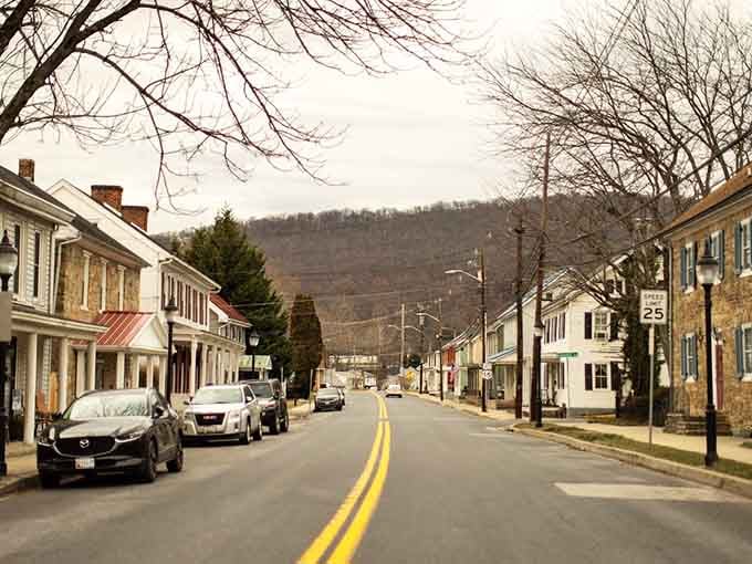 Main Street stretches toward the Catoctin Mountains like a postcard that forgot it's supposed to look old-fashioned.