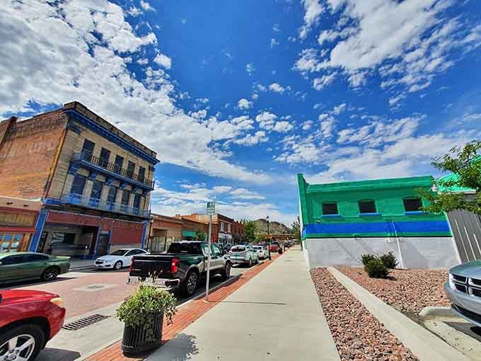 Those colorful storefronts aren't trying too hard; they're just naturally photogenic under that impossibly blue Colorado sky.
