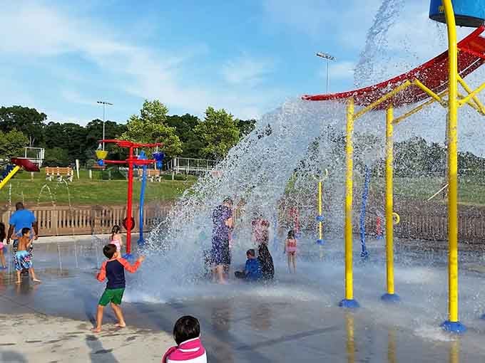 When the splash pad erupts, pure joy follows, and suddenly everyone's a kid again.