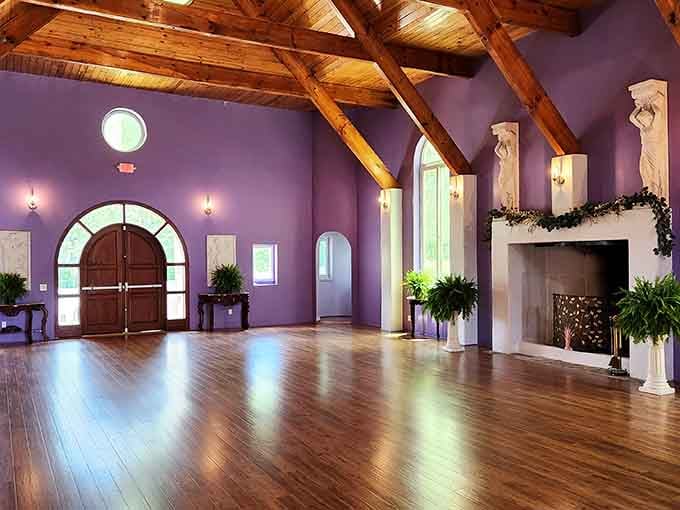 Purple walls and exposed beams create a ballroom where your family reunion suddenly becomes a royal affair.