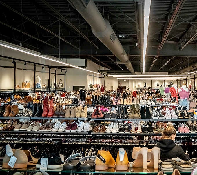 Rows of shoes stretch into infinity, proving that footwear heaven exists and it's surprisingly affordable.