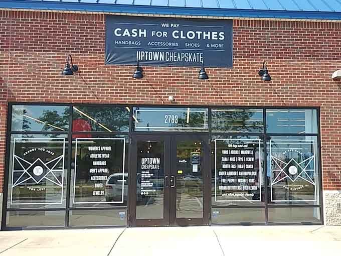 That "We Pay Cash for Clothes" sign is basically an invitation to fund your next shopping spree guilt-free.