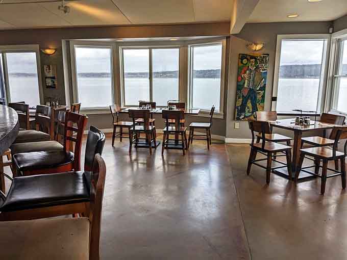 Floor-to-ceiling windows frame Puget Sound like a living postcard while you wait for your pie to arrive.