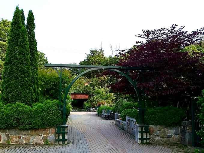 This charming garden bridge proves that even infrastructure can have a soft side when someone cares enough.